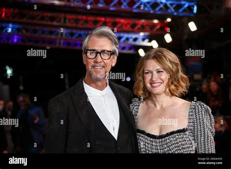 Alan Ruck Left And Mireille Enos Pose For Photographers Upon Arrival
