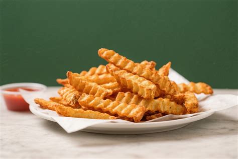 Copycat Raising Canes Crinkle Cut Fries Recipe Crispy Fluffy And