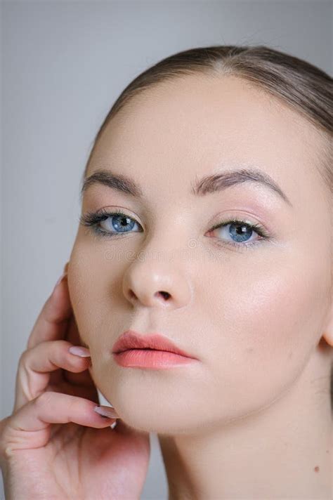 Beautiful Adult Girl Posing With Nude Makeup With Clean Skin And Care