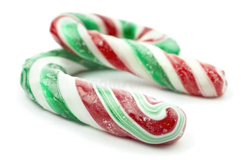 Two Candy Canes Stacked On Top Of Each Other Perfect For Holiday Decorations Or As A Fun Prop
