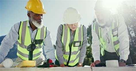 Architecture Collaboration And Blueprint With Construction Worker People On Building Site