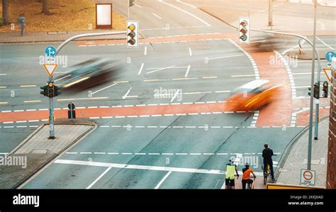 Aerial View Of The City Crossroads Intersection Junction With Motion Blurred Traffic Of Cars And