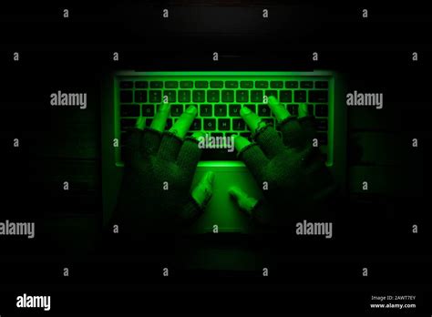 Top View Of Hacker Hand Typing On Laptop Keyboard Sealing Data Stock Photo Alamy