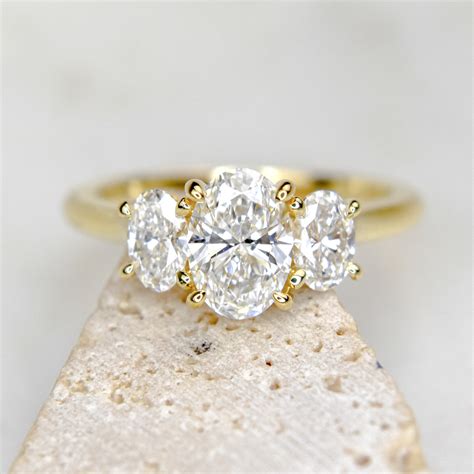 Yellow Gold Oval Cut Diamond Trilogy Ring Monty Adams Jewellery