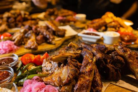 Assorted Meat On A Plate Close Up Different Types Of Meat And Potatoes