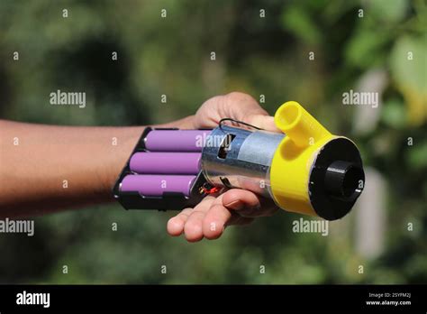 Small Pump Held In The Hand With Battery Pack Water Pump Of