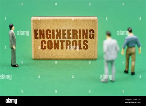 Security And Insurance Concept On The Green Surface Are Figures Of