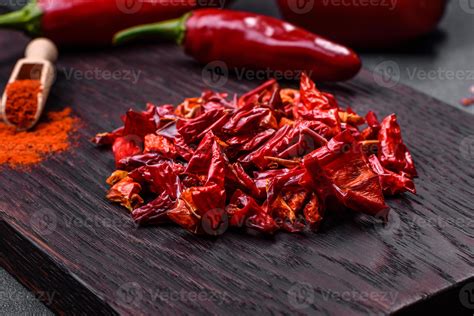 Pieces Of Dried Paprika Preparation Of Powder Spice For Various Dishes