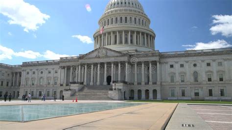 Iconic U S Capitol Building Under Blue Sky Historic Architecture And Political Landmark In