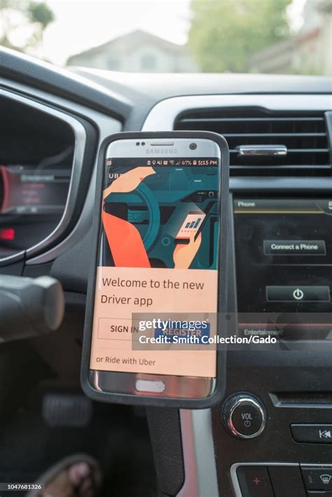 Close Up Of A Smartphone Displaying The Uber Driver App Installed On News Photo Getty Images