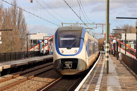 Slt Train Of Ns Along Platform Of Train Station Nieuwerkerk Aan Den