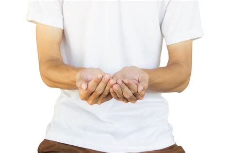 Premium Photo Midsection Of Man With Hands Cupped Standing Against