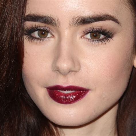 Lily Collins Makeup Black Eyeshadow Brown Eyeshadow And Red Lipstick