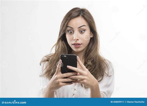 Shocked Woman Looking At Phone Young Girl Shocked Looking At Mobile