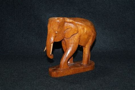 Vintage Wooden Elephant Figurine With Tusks Etsy Elephant Figurines