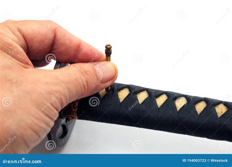 Closeup Shot Of A Person Assembling The Handle Of A Traditional