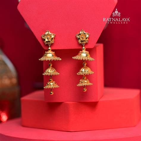 Floral Golden Stylish Three Layer Gold Jhumkas Ratnalaya Jewellers