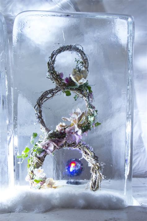 Ice Sculpture Of Flowers In A Frozen Block Of Ice Stock Image Image