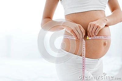 Pregnancy Body Measurements Pregnant Woman Measuring Belly Royalty