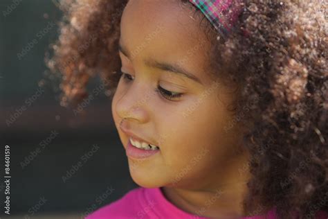Foto Stock Bambina Mulatta Adobe Stock