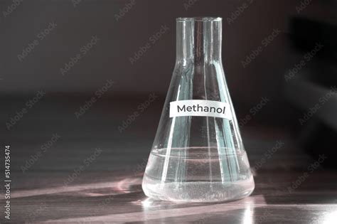 Methanol In A Glass Flask Sunlight Passes Through The Bulb And Creates Refraction Methanol