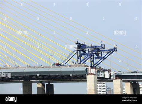 Heavy Lifting Installed At Suspension Bridge Construction Site Stock