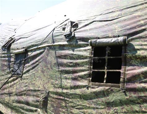 Military Tents With Green Camouflage Fabric In A Training Camp Near The