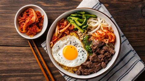 Delicious Bowl Of Korean Bibimbap Topped With Beef Colorful Vegetables