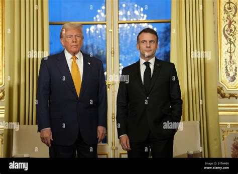 French President Emmanuel Macron Right Poses With President Elect