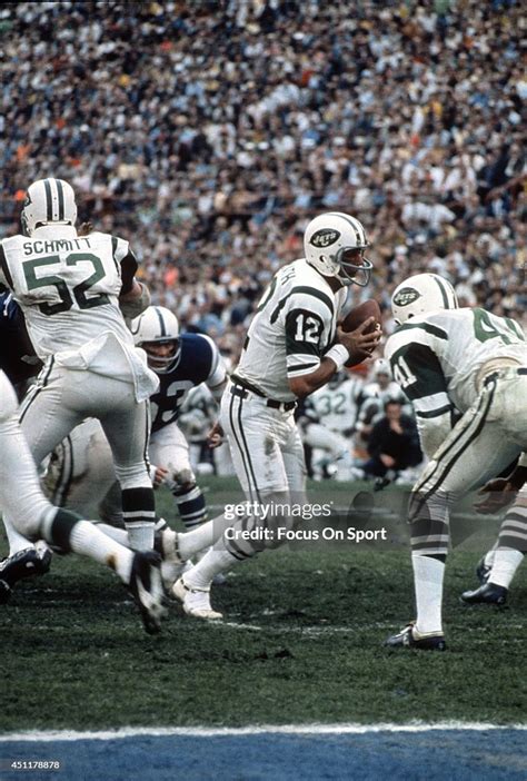 Joe Namath Of The New York Jets Turns To Hand The Ball Off To Matt