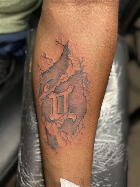 Gemini Symbol Tattoo For Men