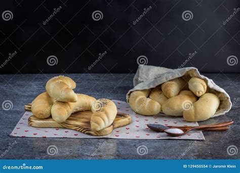 Homemade Traditional Czech Pastry White Bread Roll Rohlik With Salt And Poppy Seeds Stock