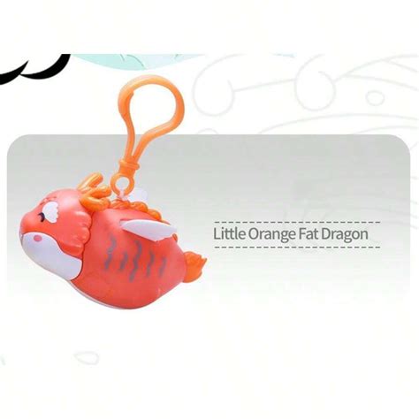 This Red Plump Dragon Pull String Flying 1pc Dragon Keychain With A