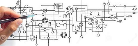 Hand Deriving Complex Technological Blueprint With Hand Drawn Flowchart And Circuits A Hand Is