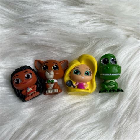 Disney Toys Disney Doorables Series 5 Rapunzel Moana Rex And Thomas Omalley Poshmark