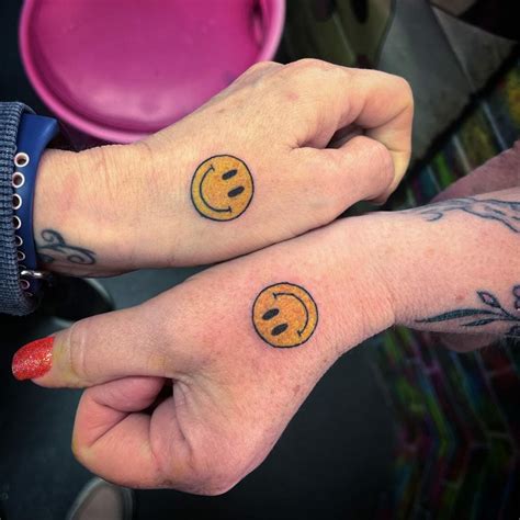Smiley Face Tattoo Meaning Joy Identity And Personal Expression