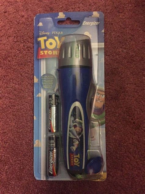 Disneys Pixar Toy Story Buzz Lightyear Flashlight By Energizer Glow In