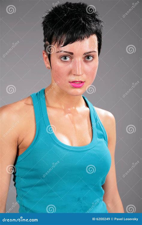 Young Sweaty Asian Woman In Sport Clothes Stretching Back And Dorsal