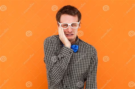 Man Nerd With Sorrowful Expression Cries With Despair Regrets Doing