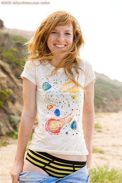 Freckled Redhead Noelle Smiling Scrolller