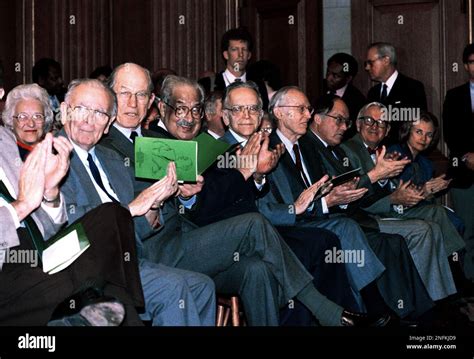 Members Of The Supreme Court Applaud During Ceremonies Held At The