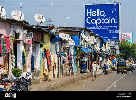The Facades Of Typical Homes Of Poor Working Class Indians With Tv Dishes On The Roofs Similar
