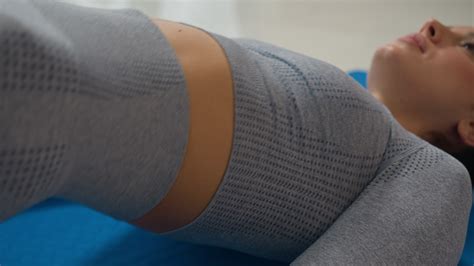 Sport Woman Female Sportswoman Doing Yoga Glute Bridge Exercise Lying On Floor On Fitness Mat