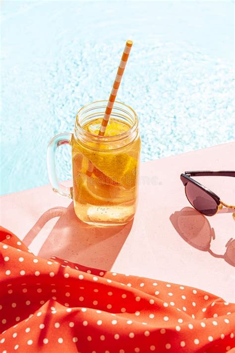 Cold Drink On A Hot Summer Day Cocktail Glass Near Swimming Pool Over