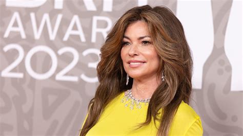 Shania Twain Dazzles In Fishnet Tights And Platinum Blonde Hair As She