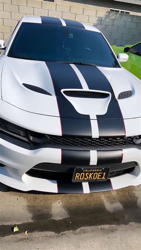 White And Black Sports Car With Racing Stripes