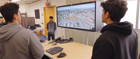 Teen Demonstrating Computer Simulation Project Techfocused Engaging Presentation Modern Classro