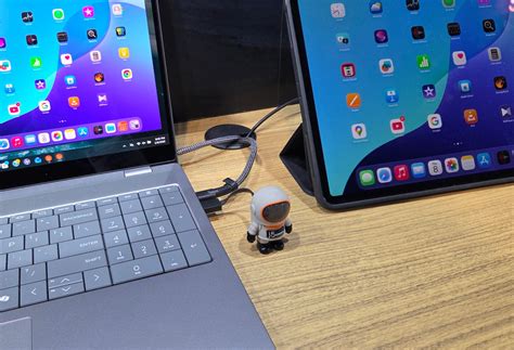 This Tiny Spaceman Helps Windows Laptops And Ipads Play Better Together