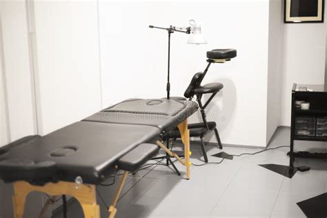Equipped Physiotherapy Room With Massage Table Specialized Treatment