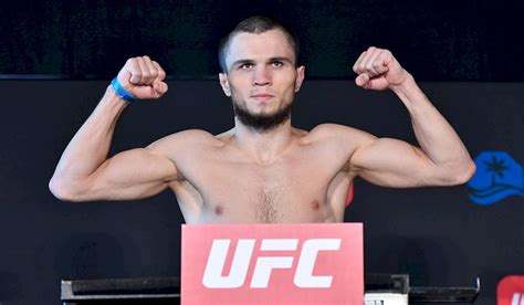 Download Umar Nurmagomedov Showing Off His Muscles Wallpaper